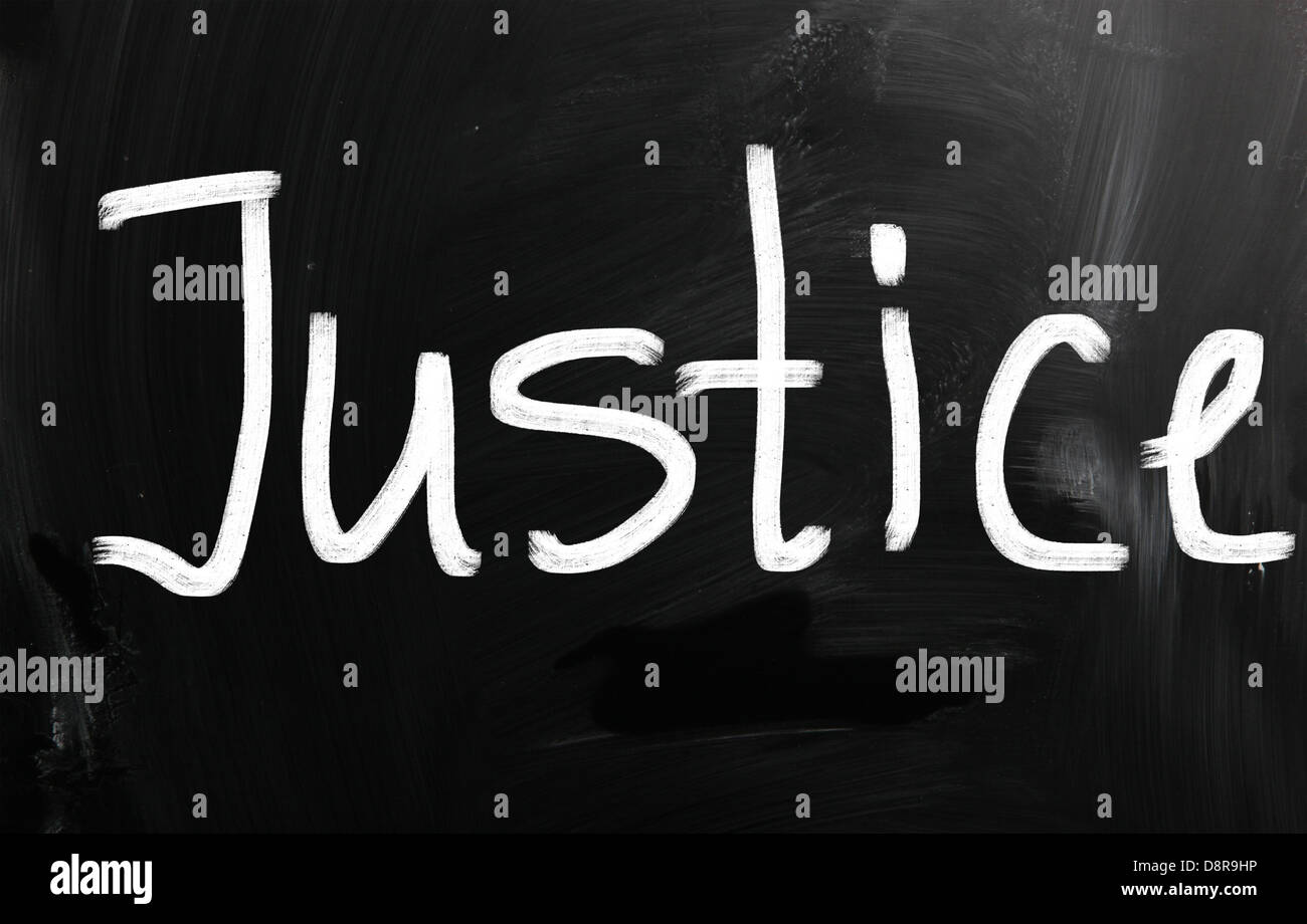 The word "Justice" handwritten with white chalk on a blackboard Stock ...