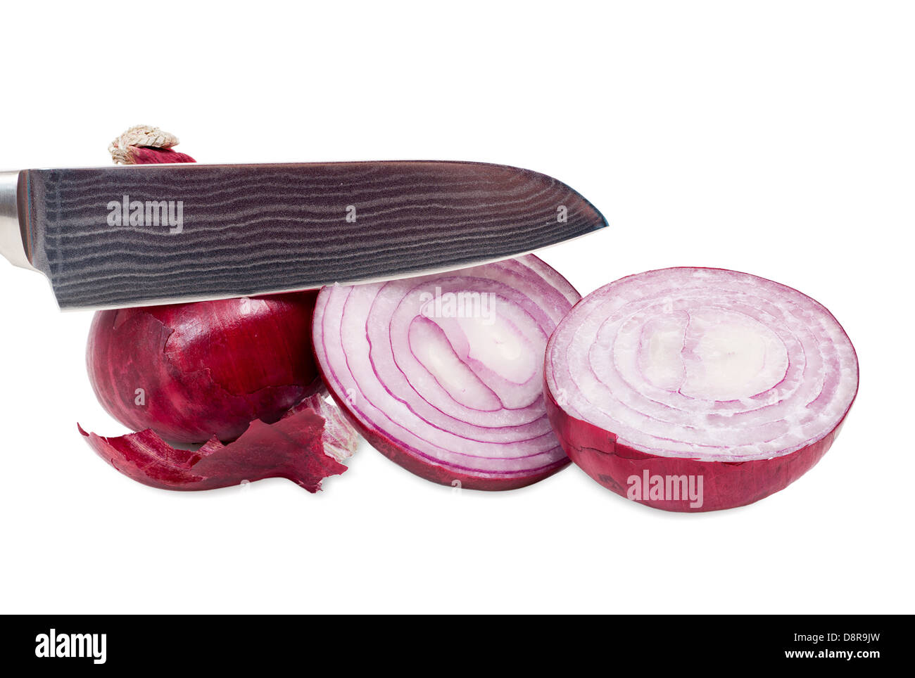 Whole and sliced red onions with knife in front of white background ...