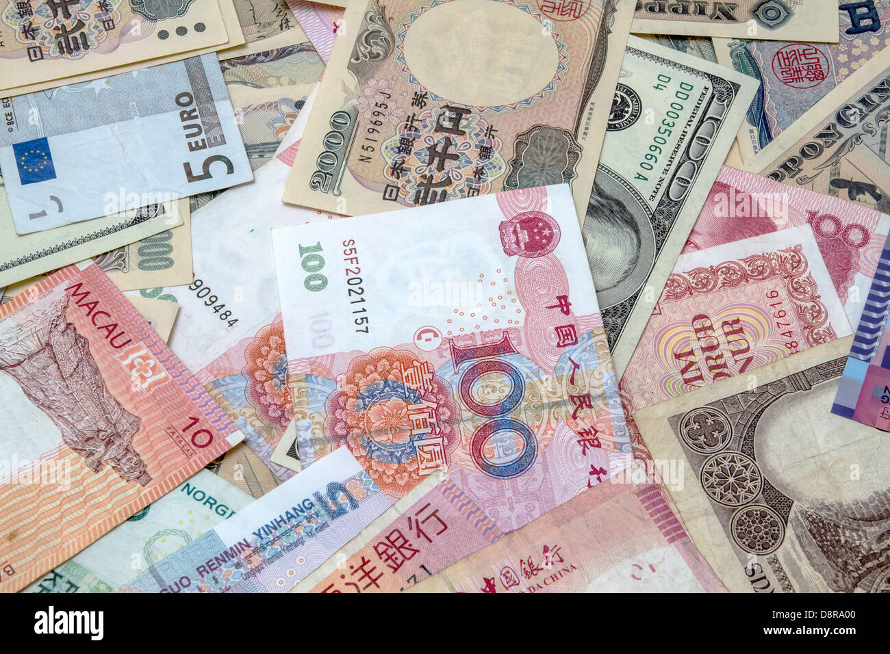 Background of different currencies Stock Photo - Alamy