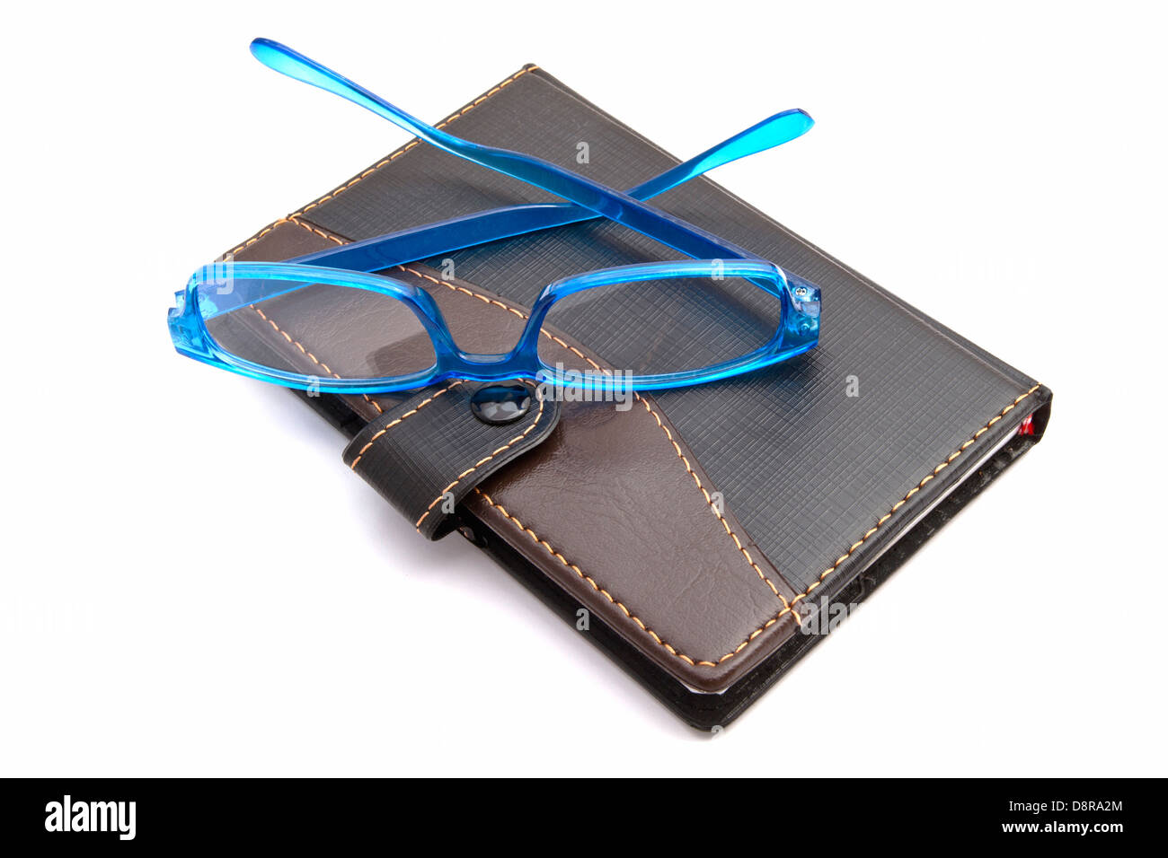 notebook and glasses isolated on white background Stock Photo - Alamy