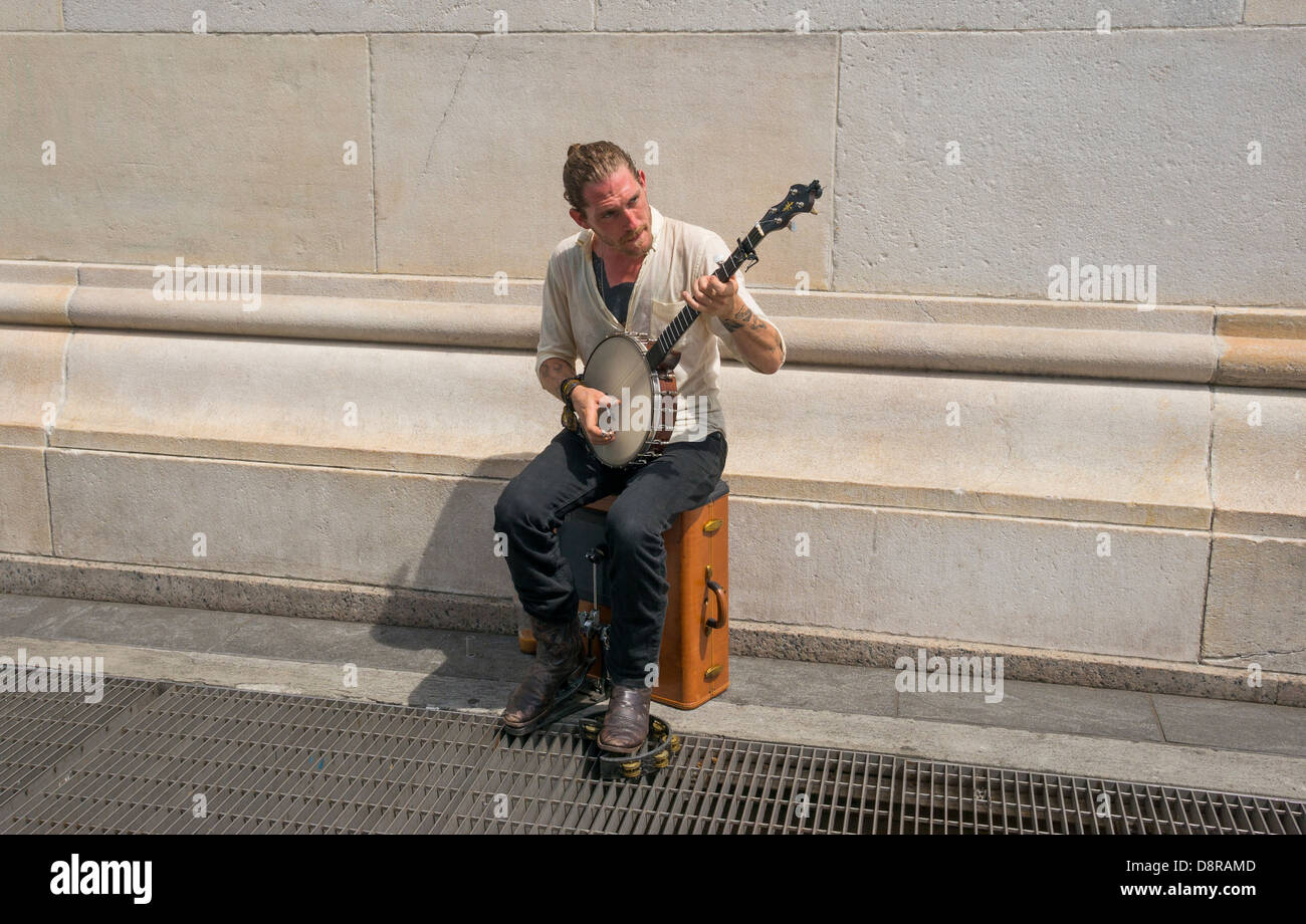 Five-string bluegrass banjo player busking in Greenwich Village in NYC ...