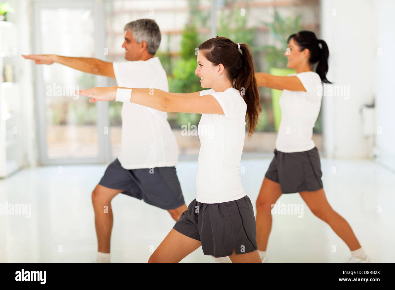 side view of healthy family exercising at home Stock Photo - Alamy