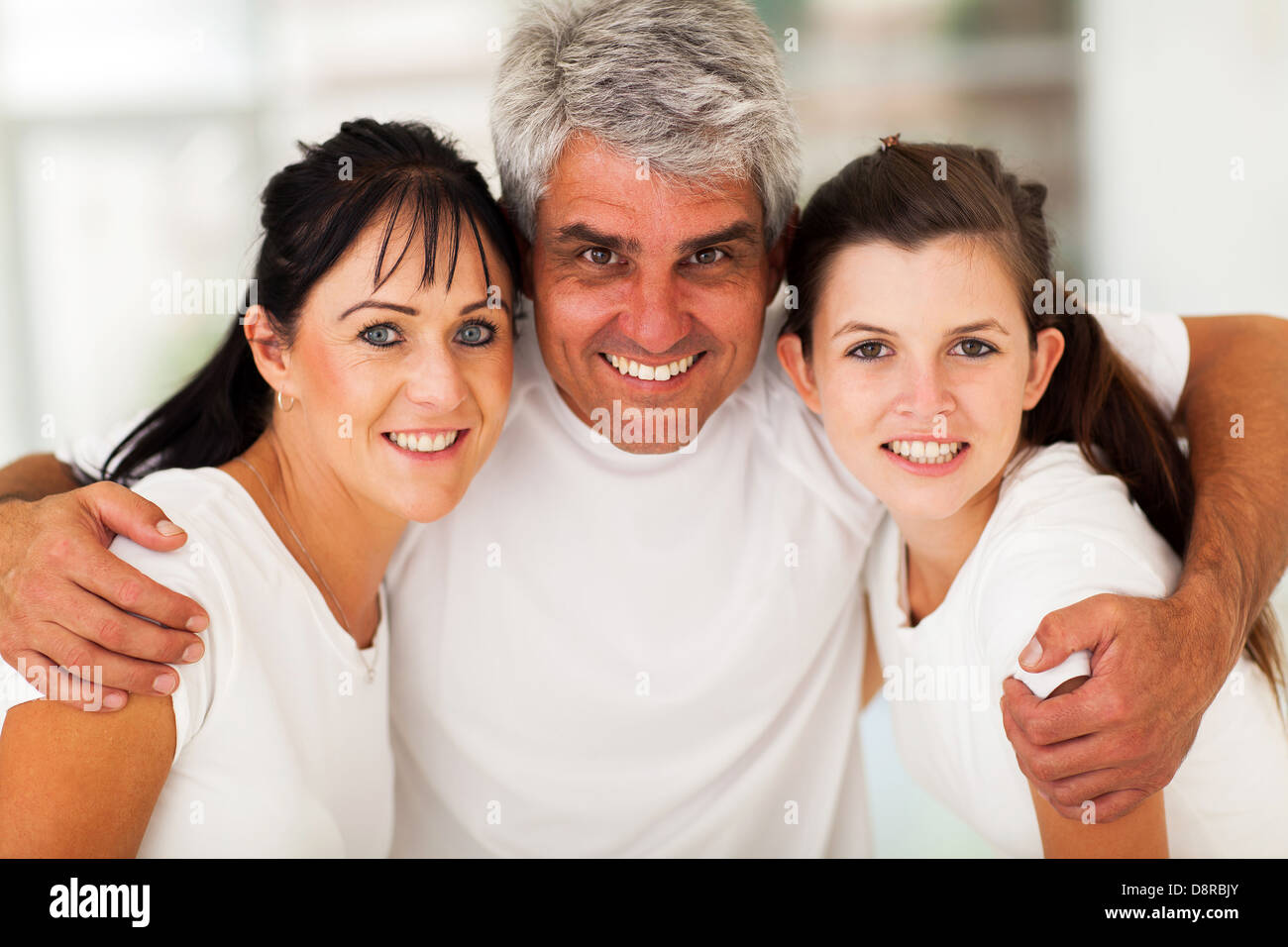 happy active family closeup portrait at home Stock Photo - Alamy