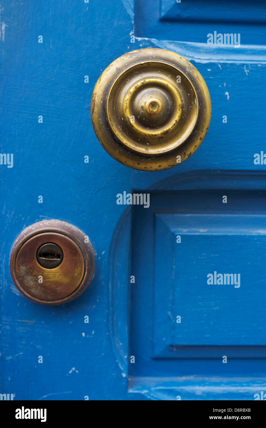 Close up of Blue door with brass handle and lock Stock Photo - Alamy