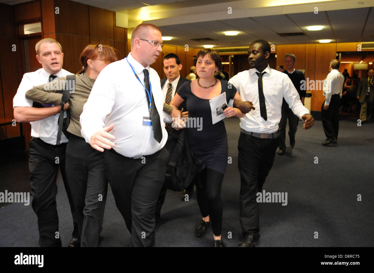 Hove UK 3rd June 2013 - Protesters are led away from the main hall ...