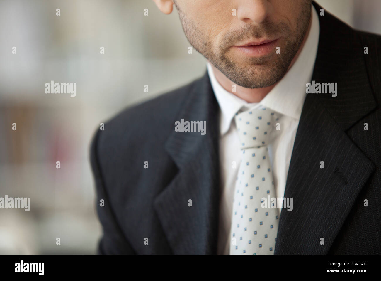 Businessman wearing suit and tie, cropped Stock Photo - Alamy