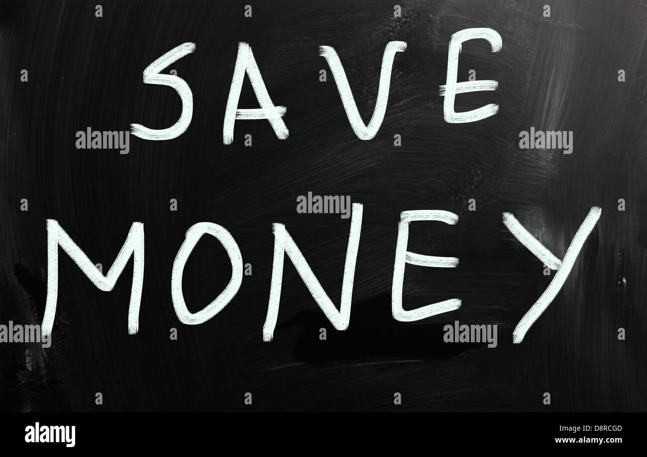Save money handwritten with white chalk on a blackboard Stock Photo - Alamy