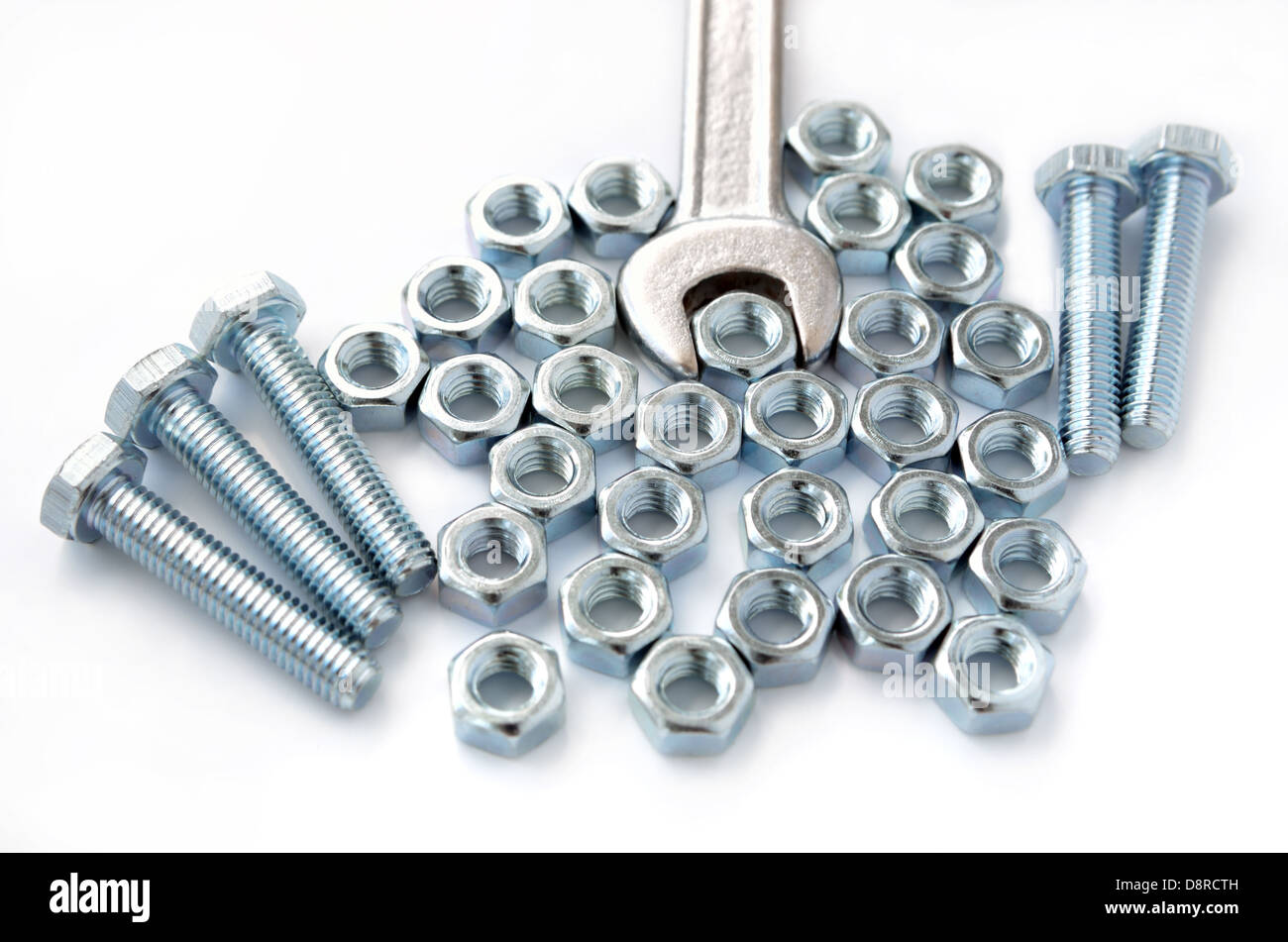 chrome spanner with nuts and bolts Stock Photo - Alamy