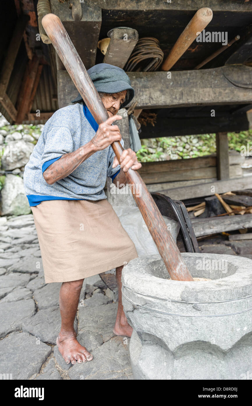 Pounding Rice High Resolution Stock Photography and Images - Alamy