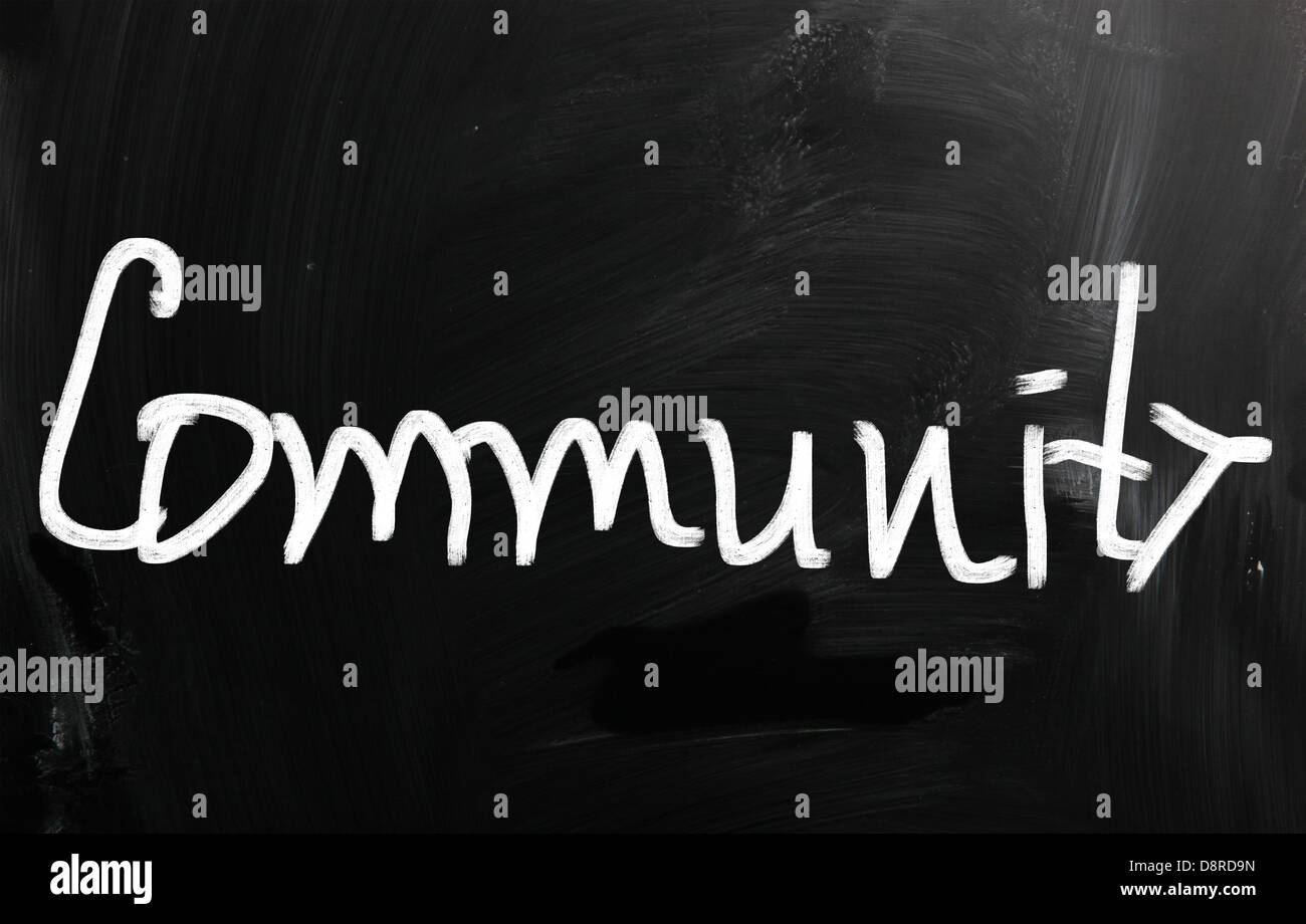 Community handwritten with white chalk on a blackboard Stock Photo - Alamy