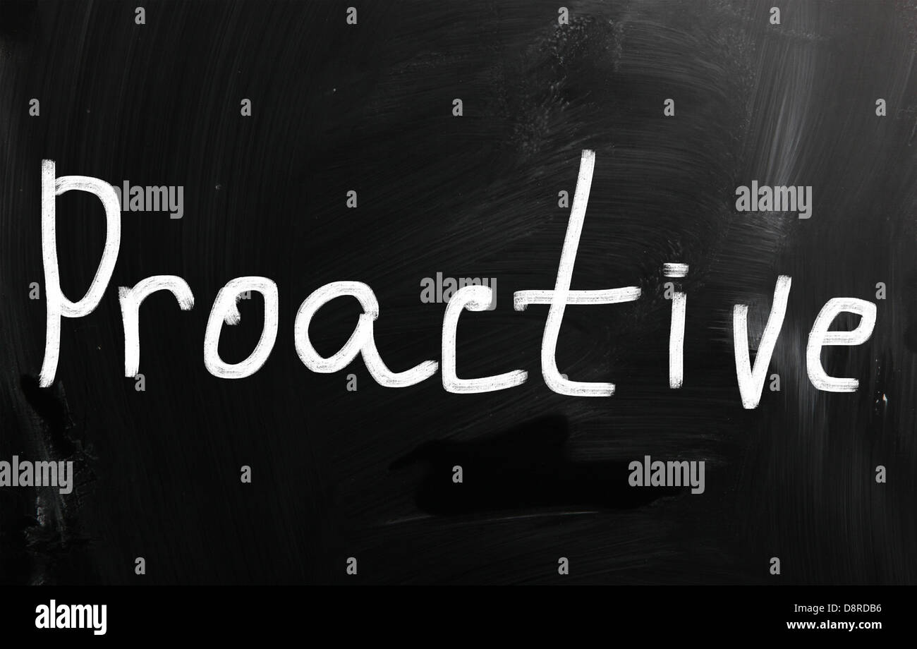 The word 'Proactive' handwritten with white chalk on a blackboard Stock ...