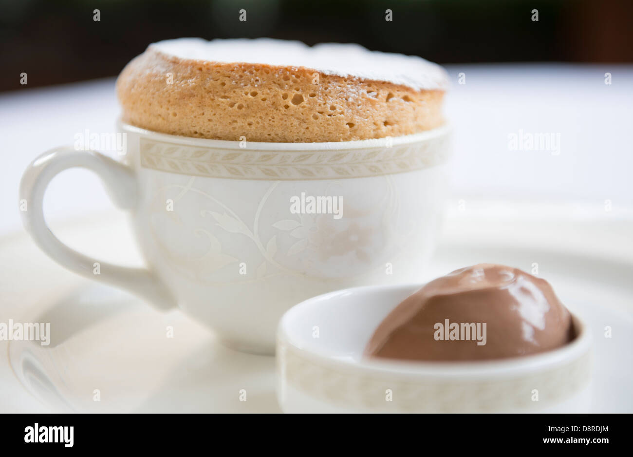 Hot toffee soufflé, with bitter chocolate ice cream dessert Stock Photo ...