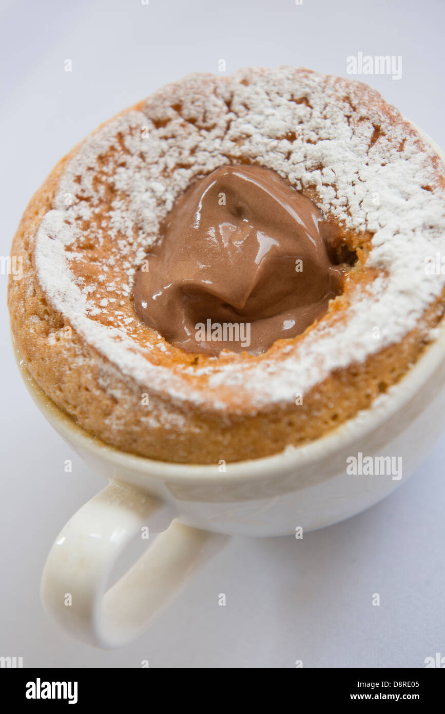Hot toffee soufflé, with bitter chocolate ice cream dessert Stock Photo ...