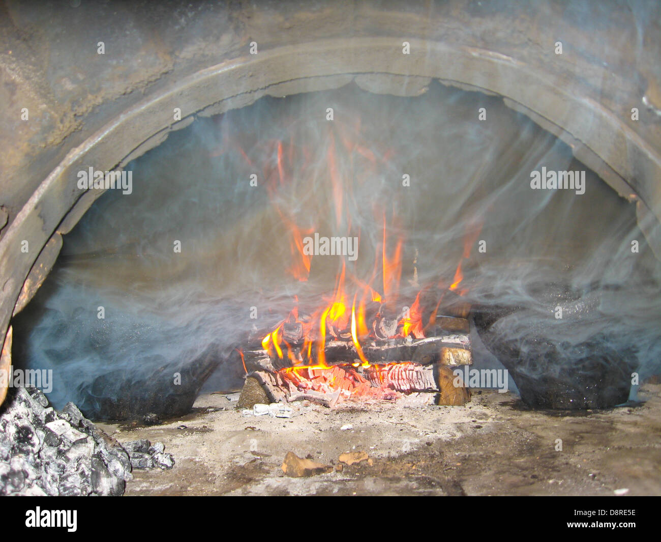 Fire wood brighly burning in the furnace Stock Photo - Alamy