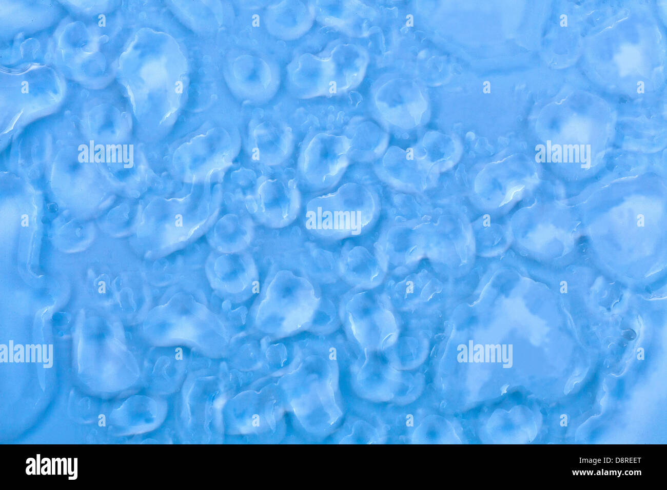 Waterdrop on a blue surface hi-res stock photography and images - Alamy