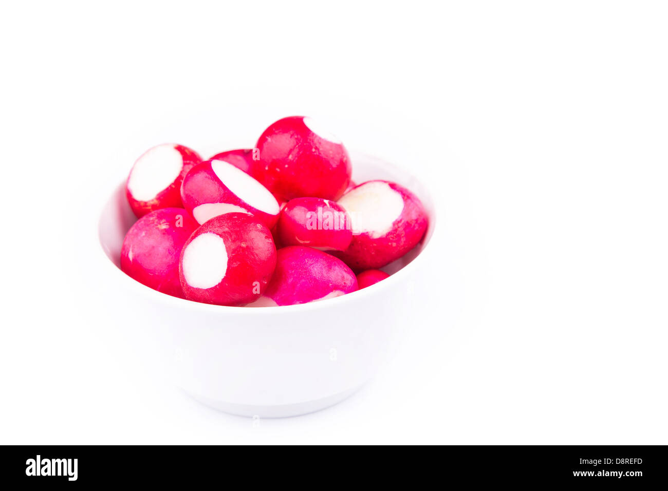 Fresh radish ready to eat served on a plate isolated on white Stock ...