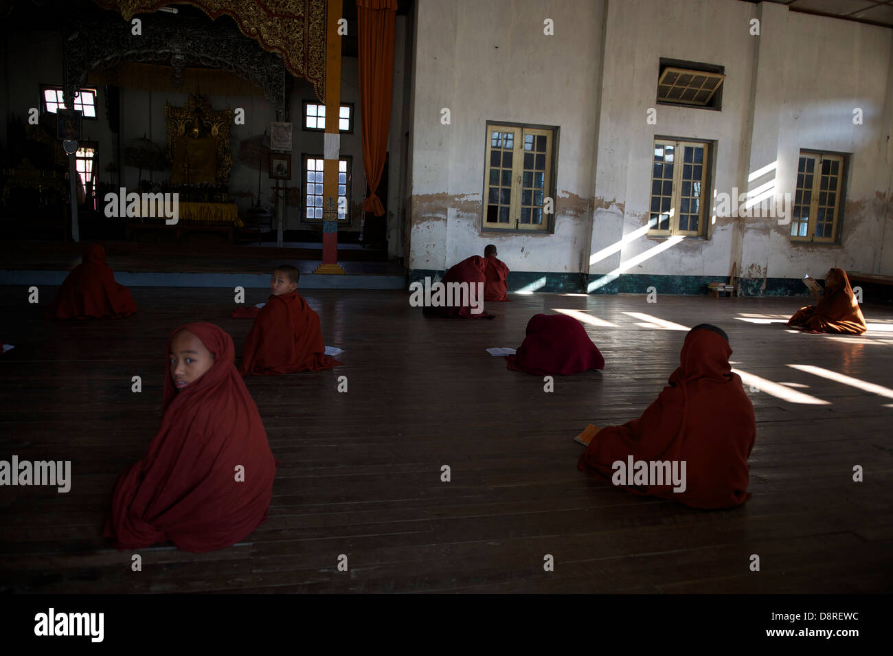 monks looking back Stock Photo - Alamy