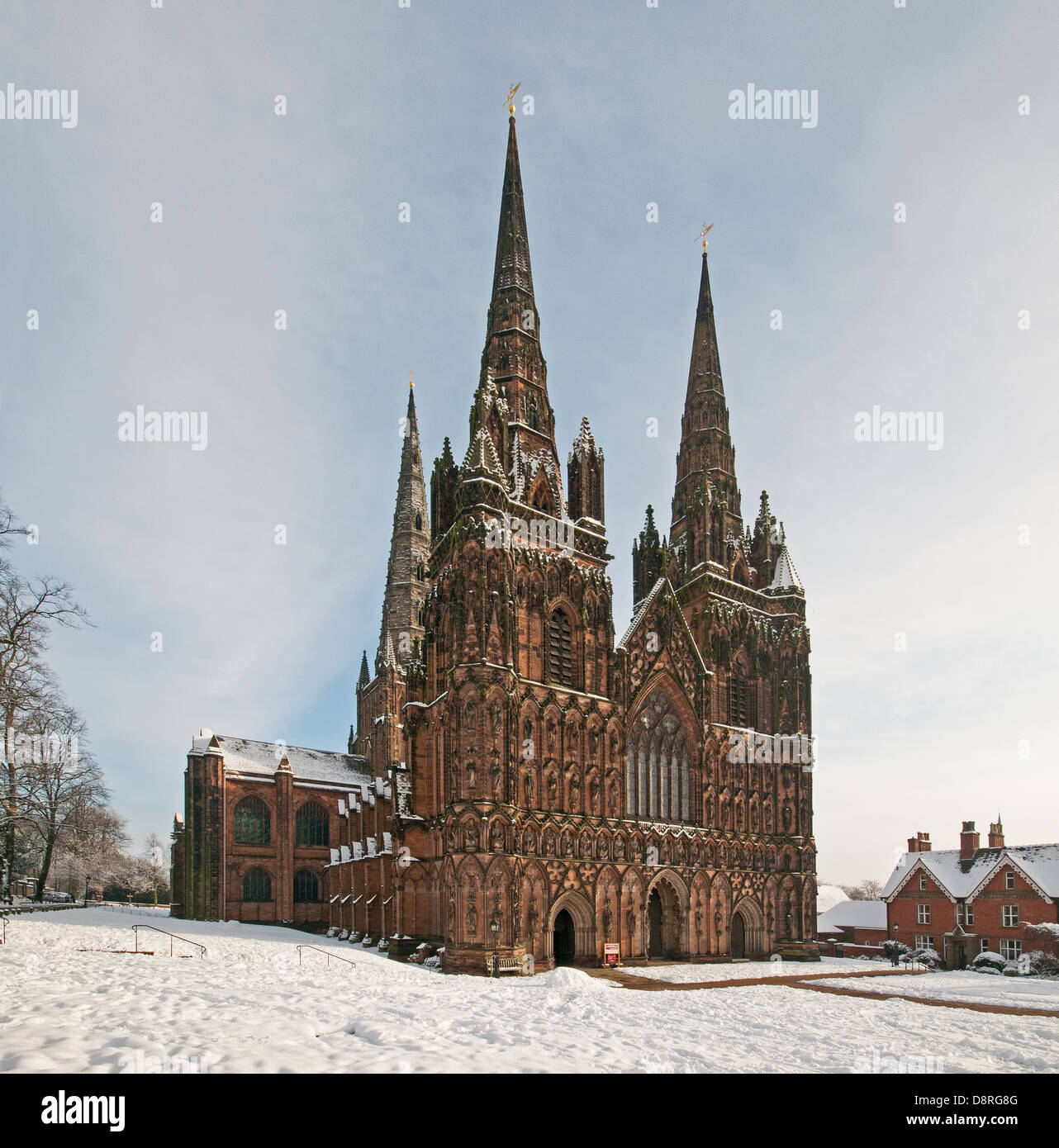 Lichfield Cathedral on a winters day with snow on the ground showing ...