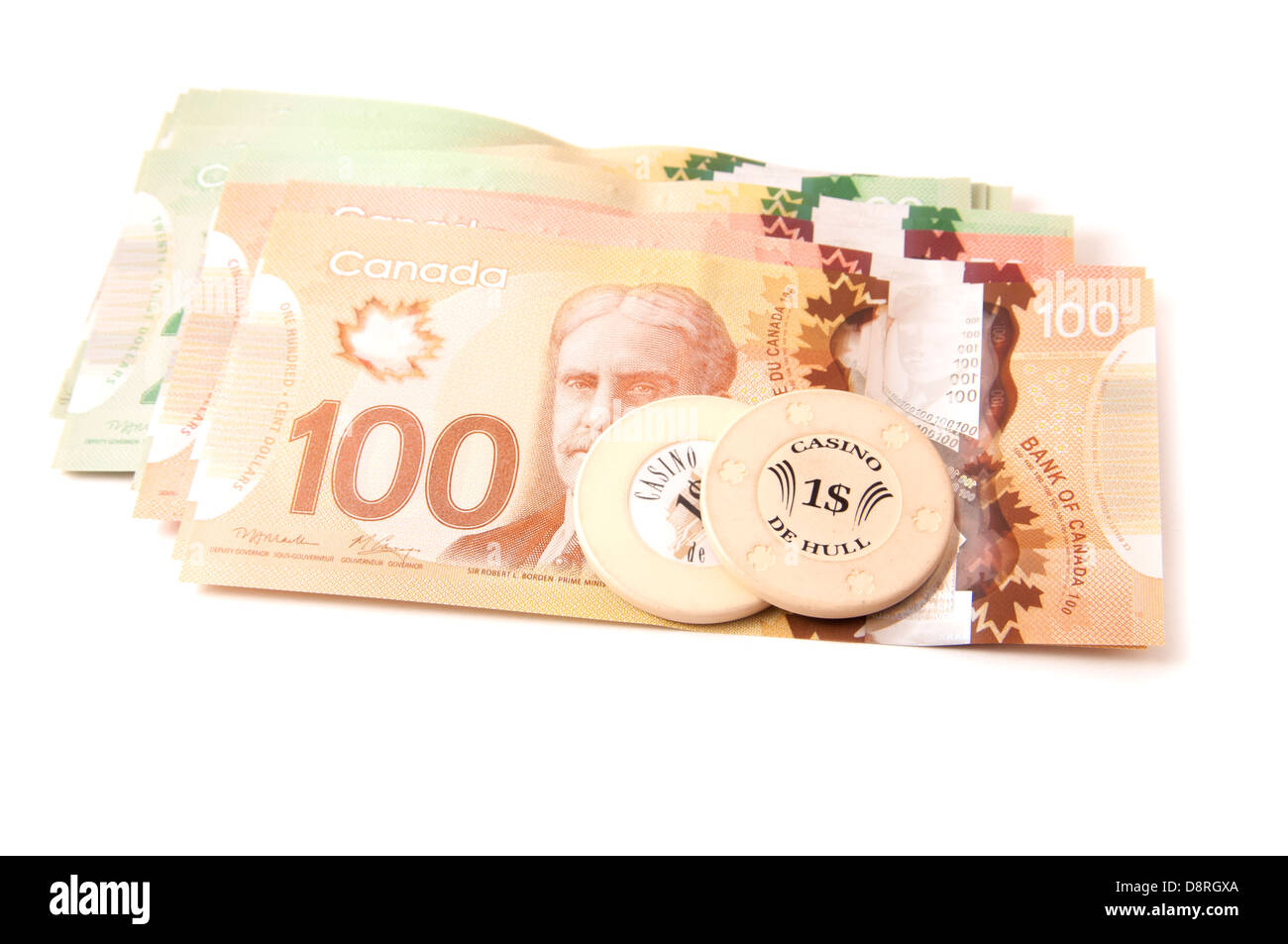 A series of Canadian banknotes and a Montreal Casino chip Stock Photo ...