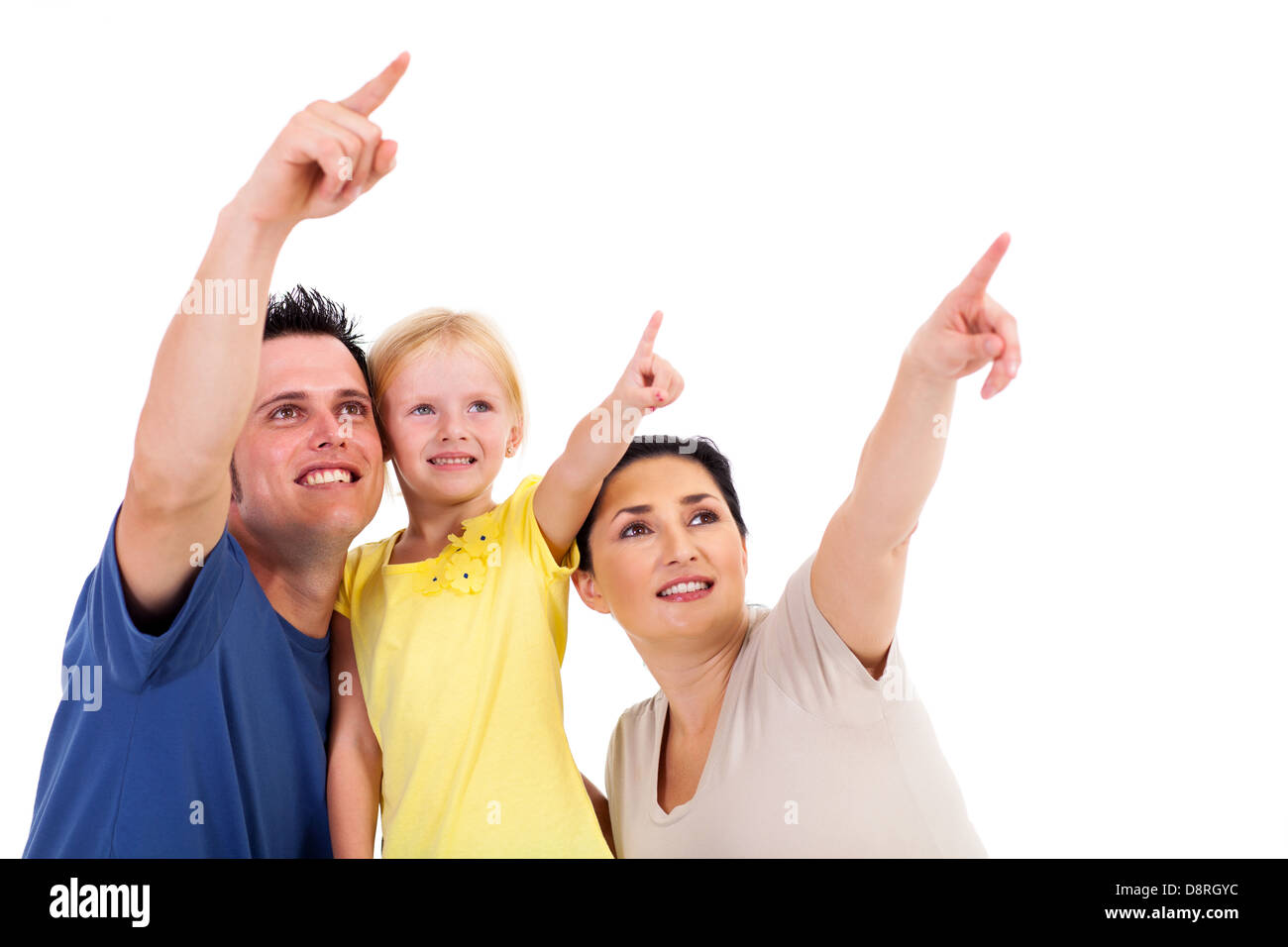 young family of three pointing at copyspace Stock Photo - Alamy
