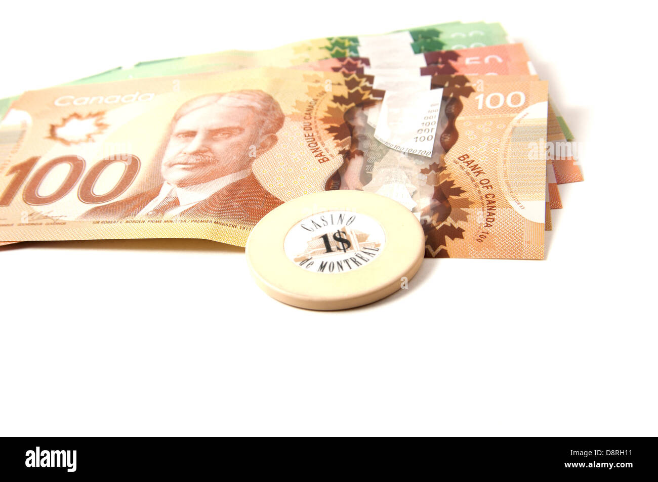 A series of Canadian banknotes and a Montreal Casino chip Stock Photo ...