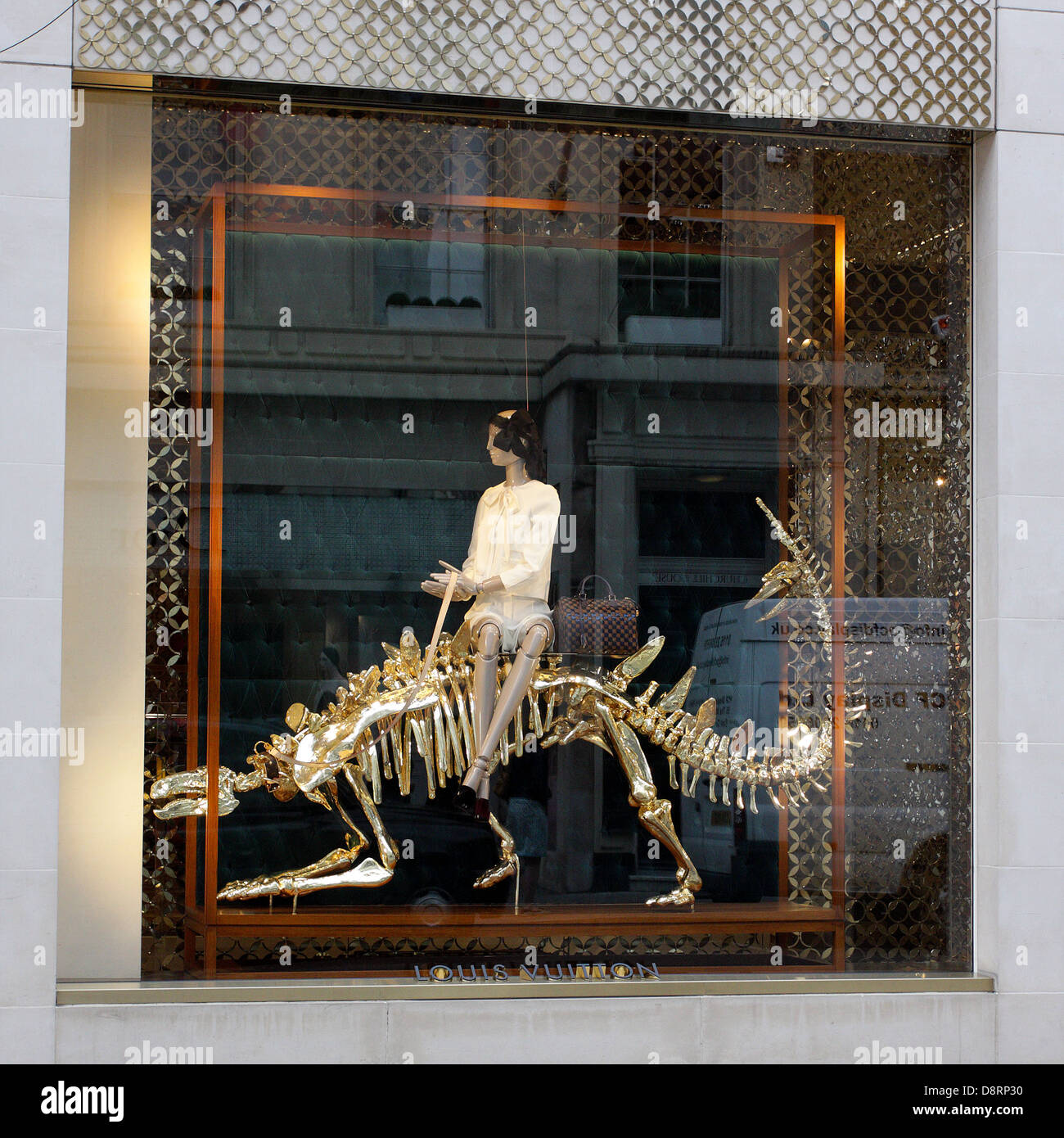 Dinosaur themed window display at Louis Vuitton`s flagship store in New ...
