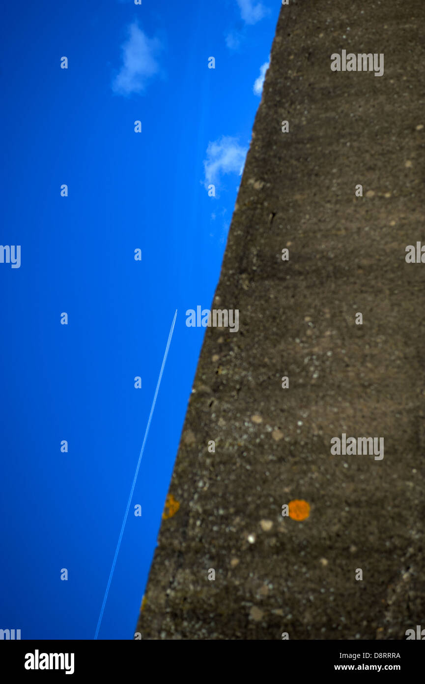 parallel flight of a jet plane to a land based concrete block Stock ...