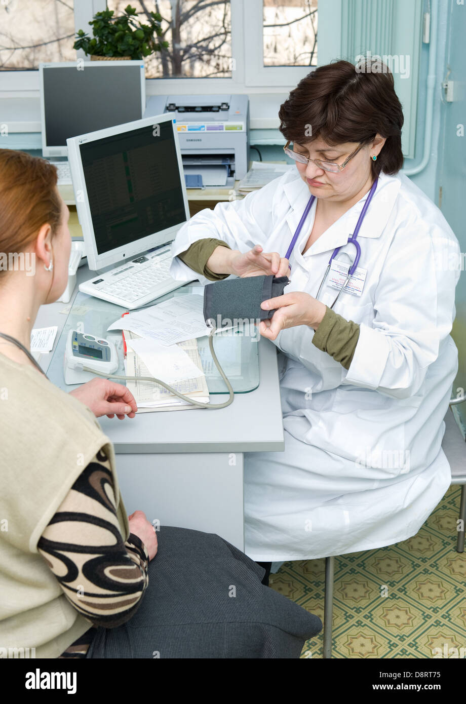 at a doctor Stock Photo - Alamy