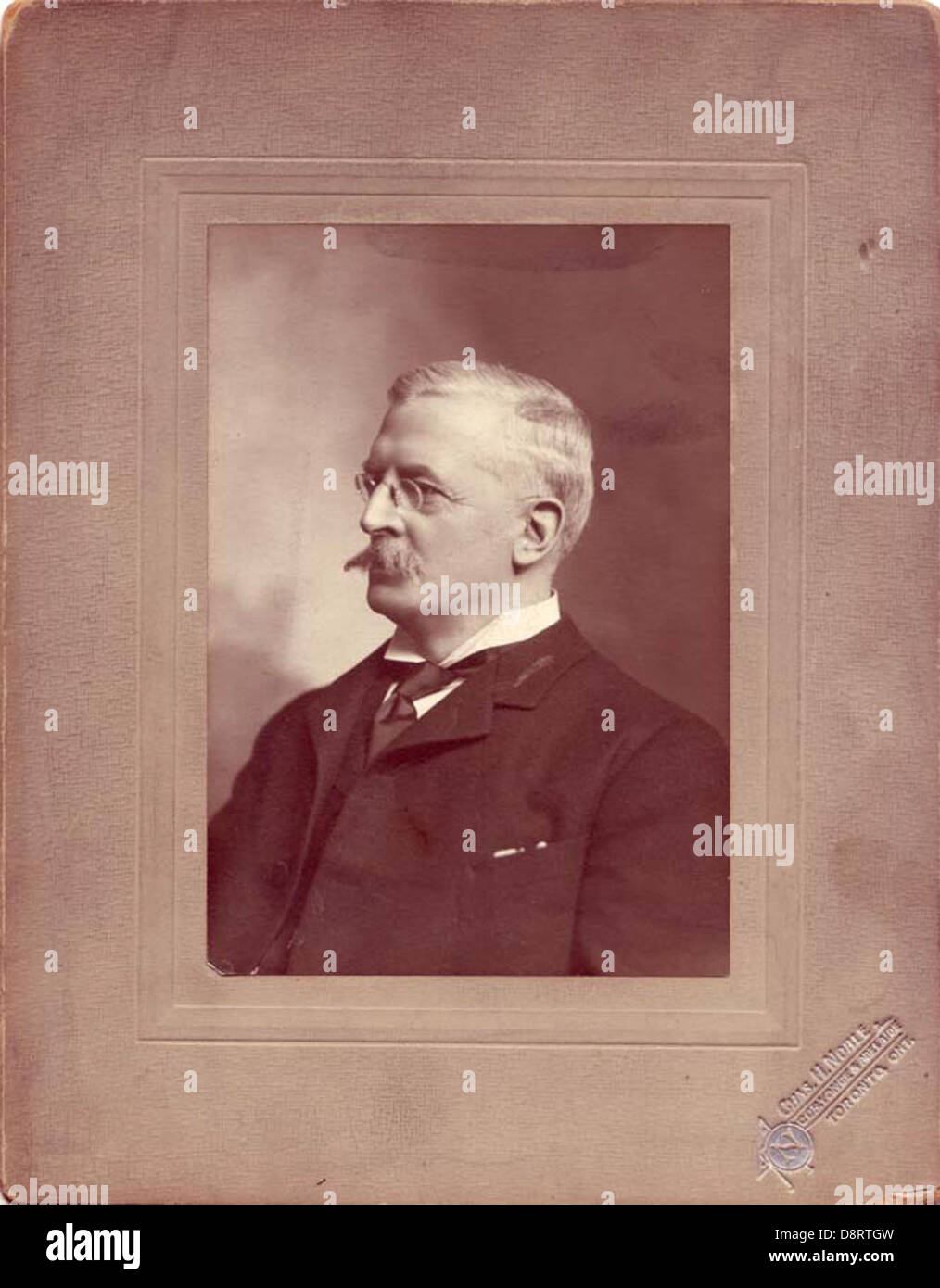 This historical photograph captures J.J. Foy, an Ontario lawyer and ...