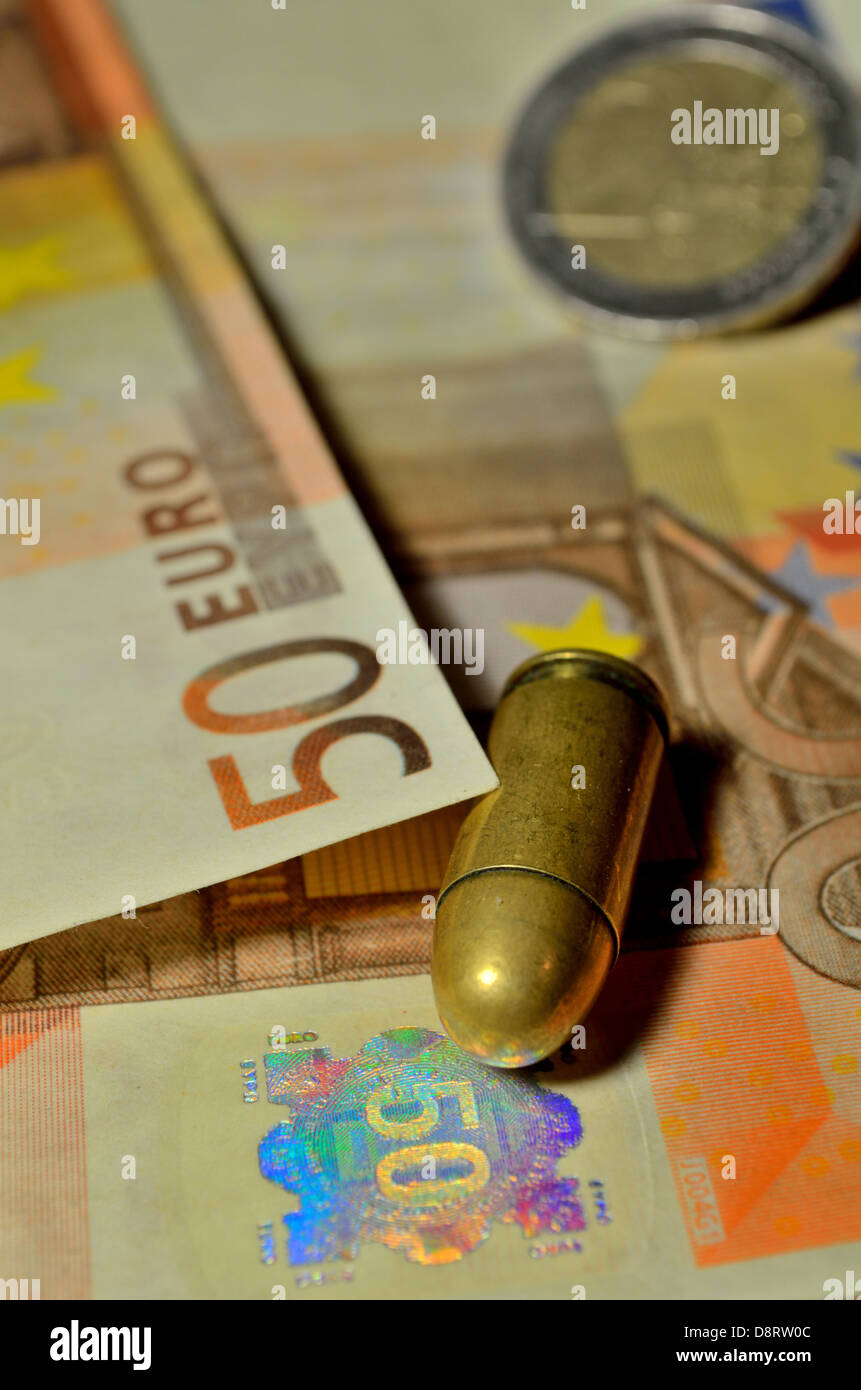 Money and bullet hi-res stock photography and images - Alamy