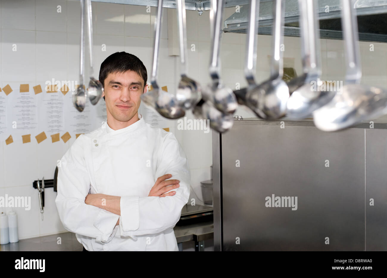 chef behind ladles Stock Photo - Alamy