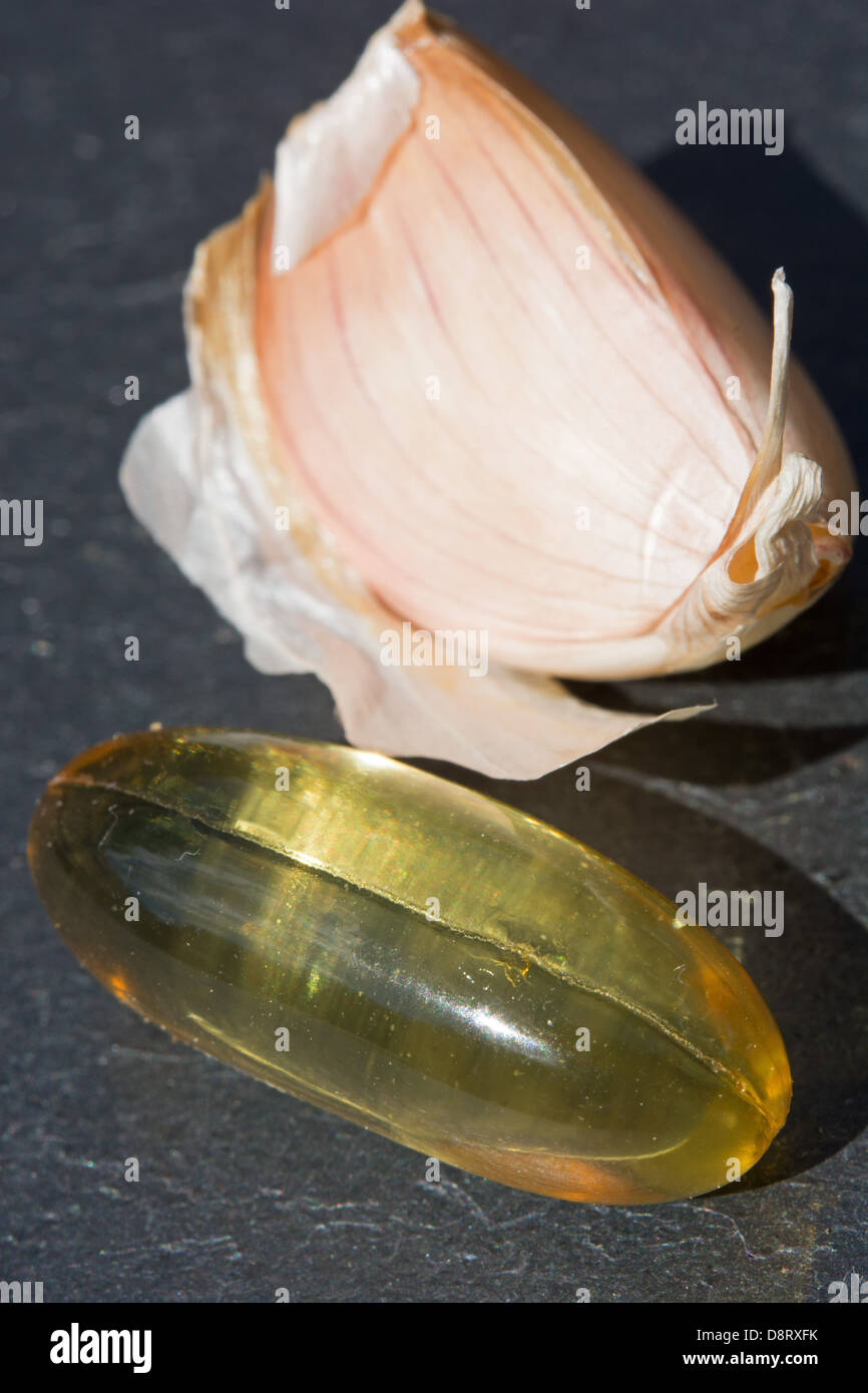 A garlic capsule containing 1000mg of garlic macerate, with the ...