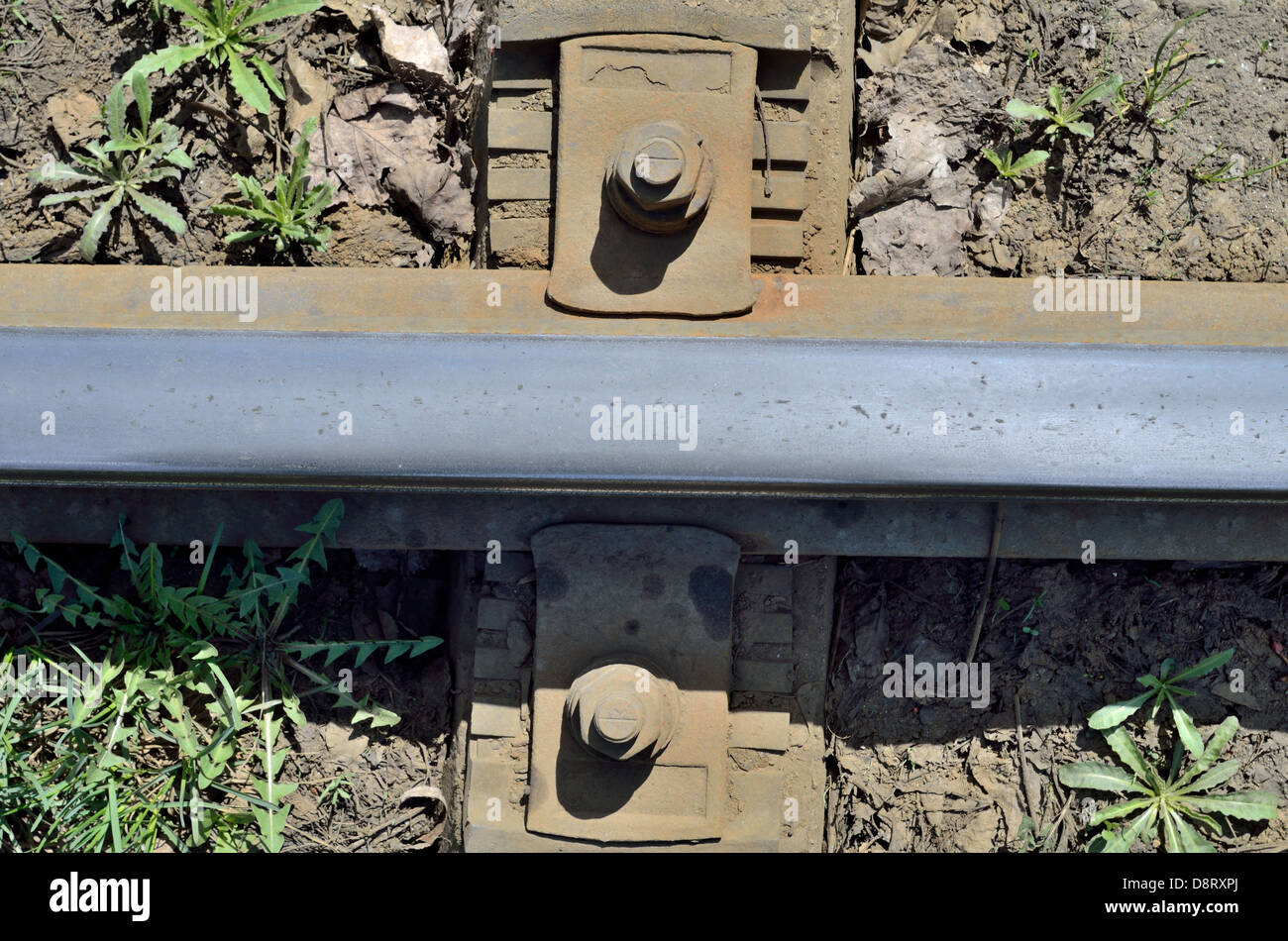 metal rail on the ground Stock Photo - Alamy