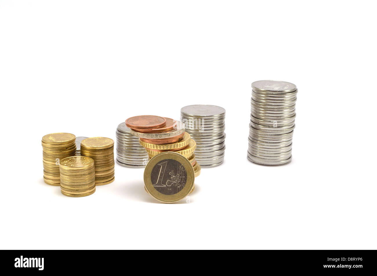 several piles of coins on white background Stock Photo - Alamy