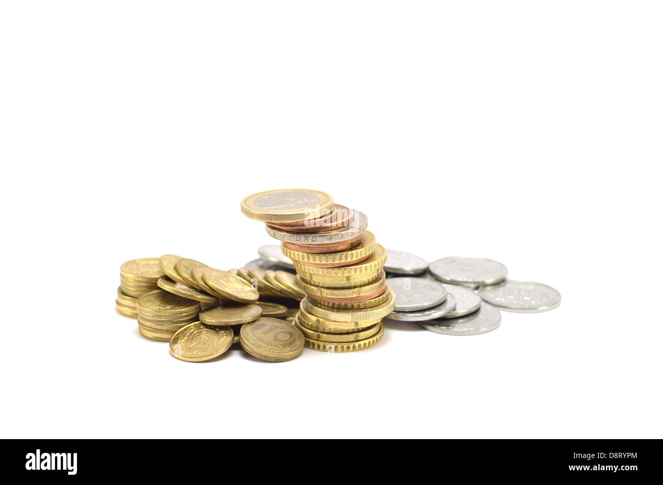stack of coins and a pile of coins isolated on white background Stock ...