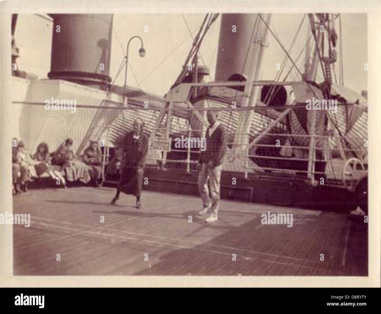 This image captures passengers aboard a ship during a trans-Atlantic ...