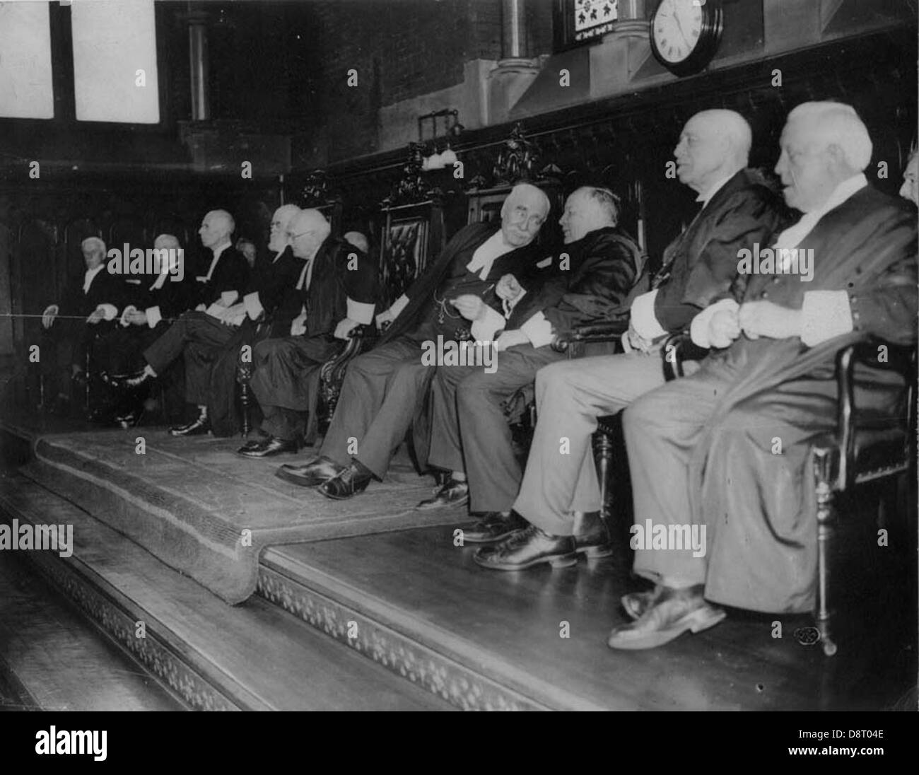 This photograph captures the moment during a Call to the Bar ceremony ...