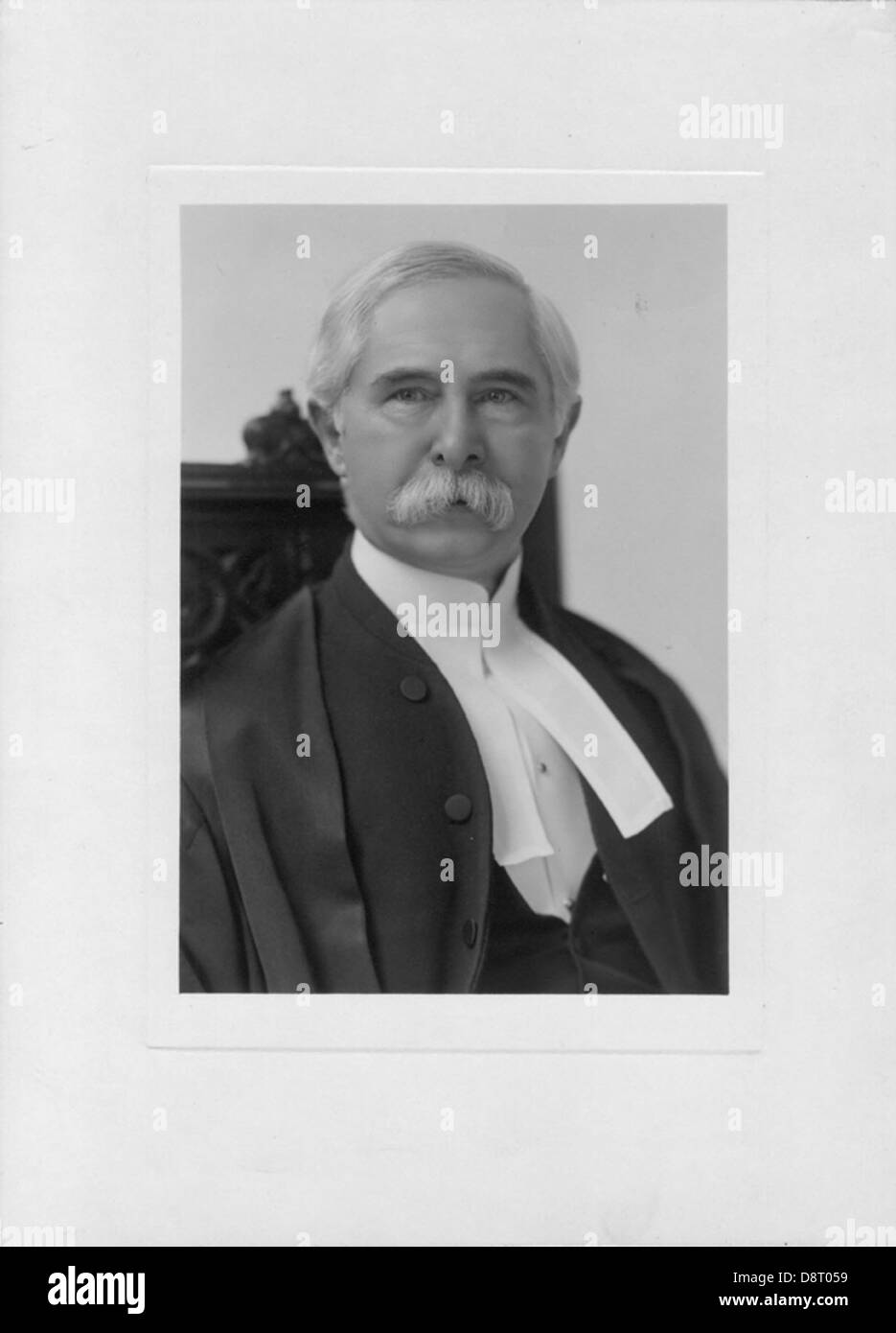A formal photograph of Justice Robert F. Sutherland, an Ontario judge ...