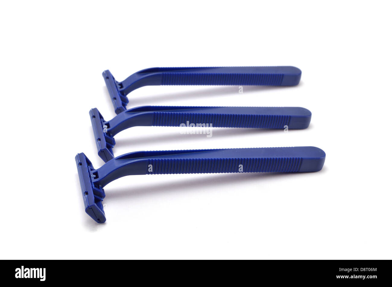 Three razor on white background Stock Photo - Alamy