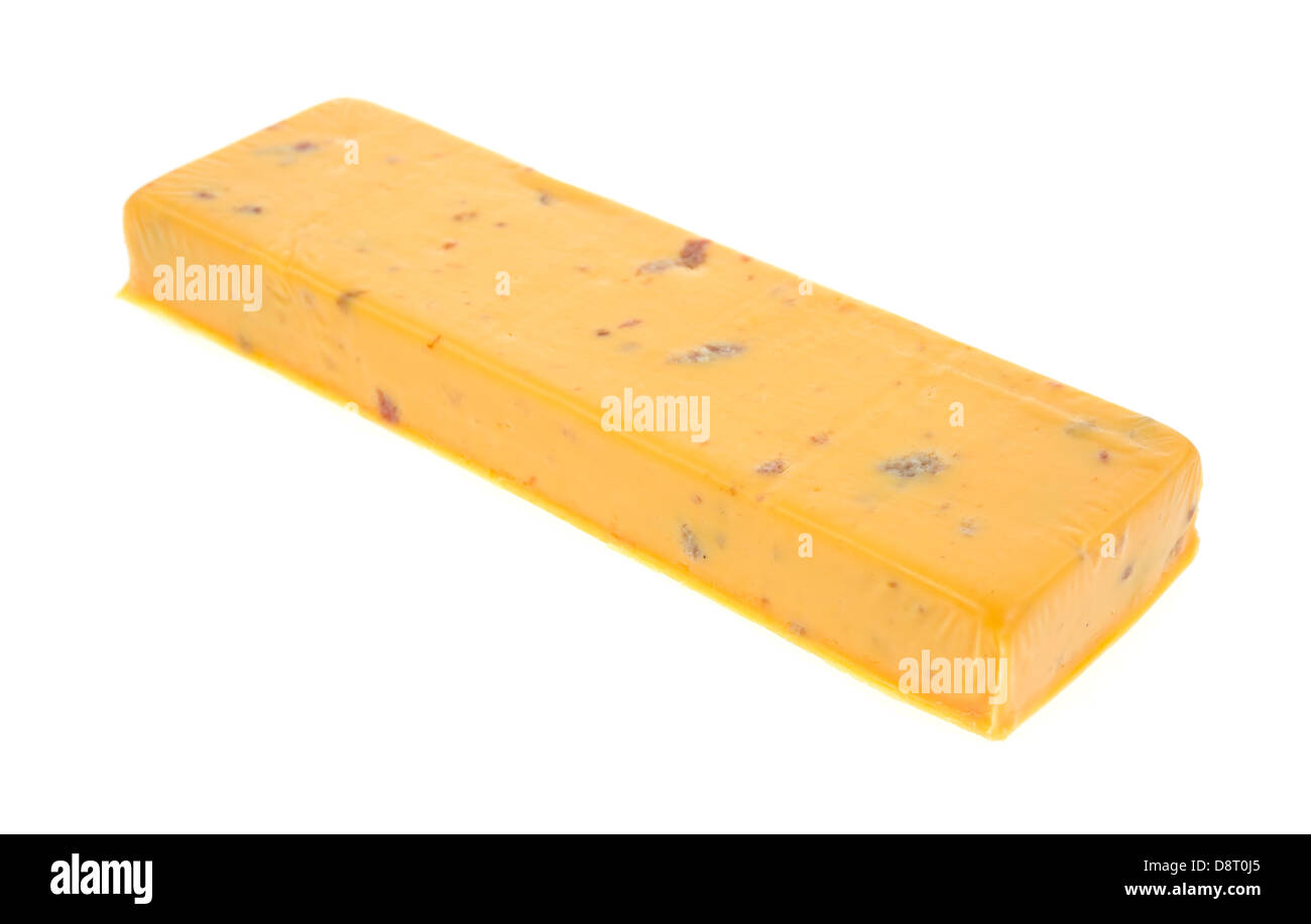 A rectangle of cheddar cheese with salami on a white background Stock ...