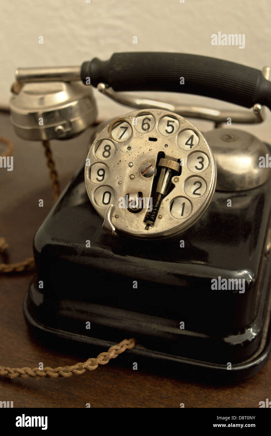An old phone in dusty and rusty condition Stock Photo - Alamy