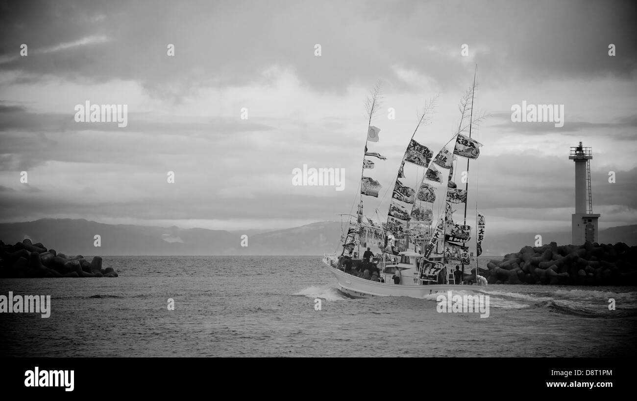 Ship setting sailing from a small fishing port in Oma in celebration of ...