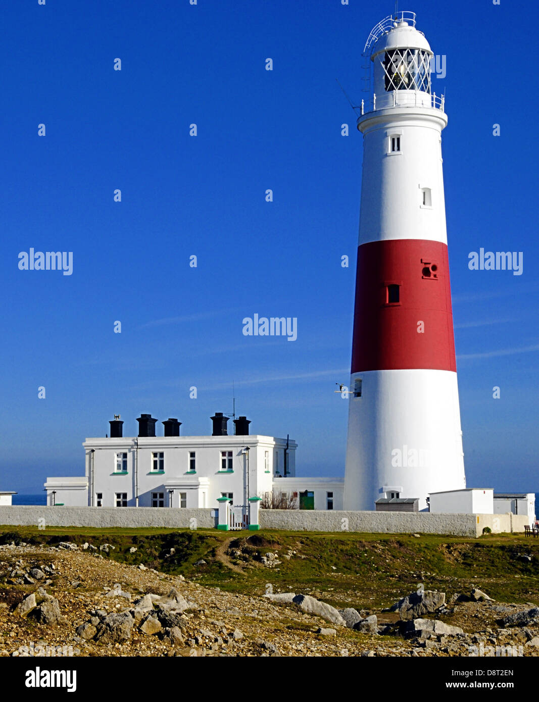 The Portland Bill lighthouse, located on the rugged coastline of Dorset ...