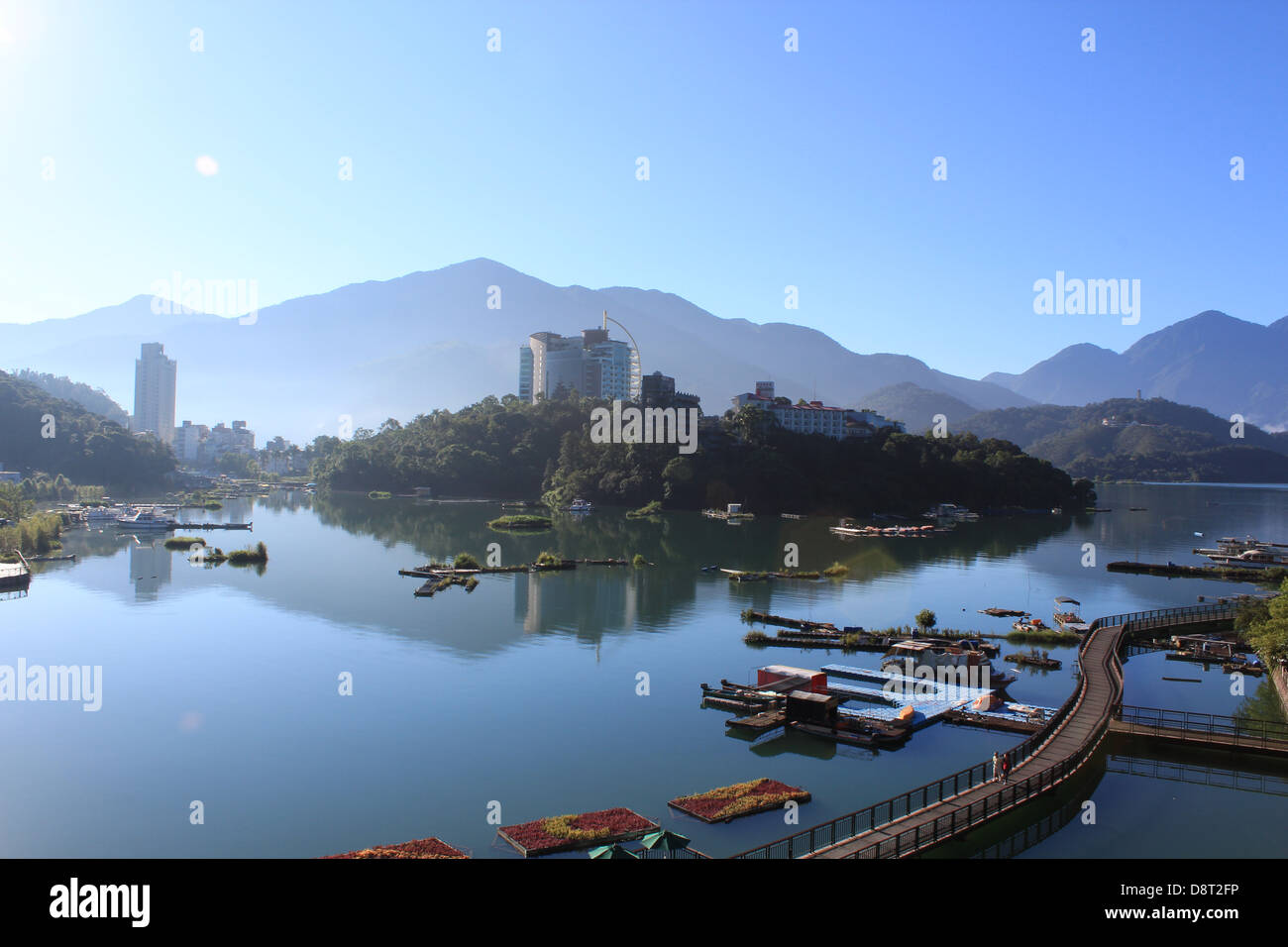 A serene morning view of the Ri Yue Tan Lake at Sun Moon Lake, Taiwan ...