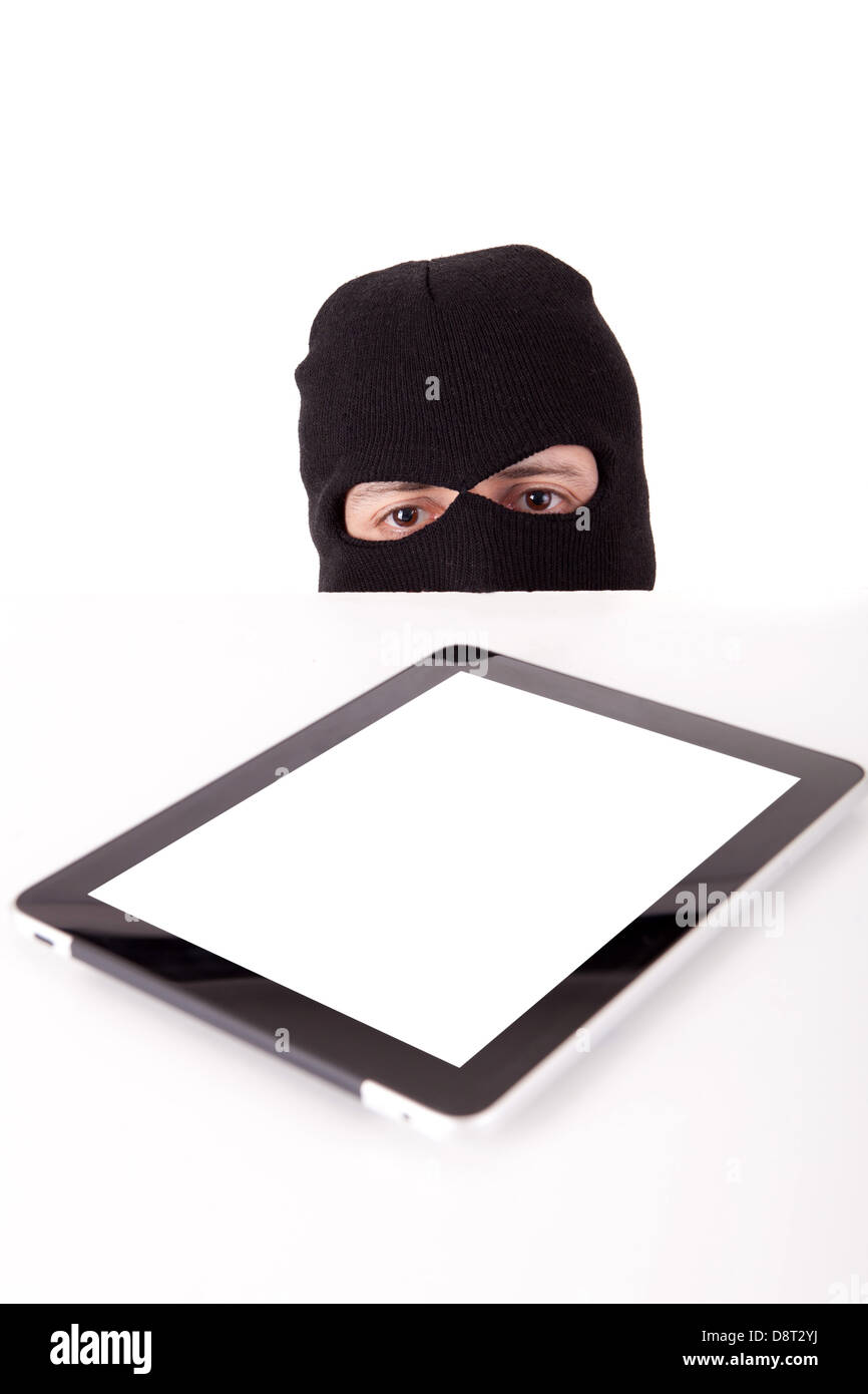 Disguised computer hacker hi-res stock photography and images - Alamy