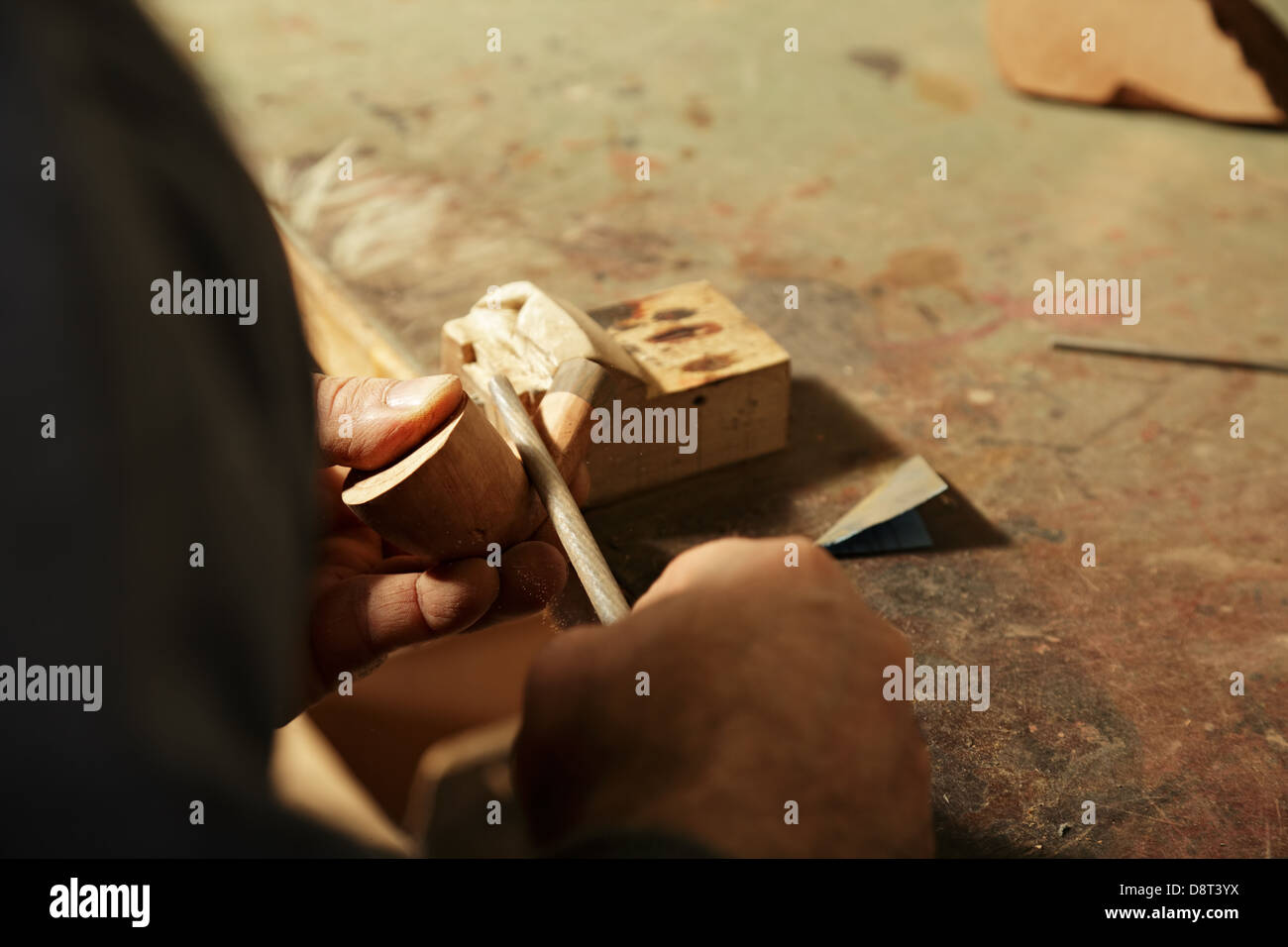 Smoking pipe being processed with file tool Stock Photo - Alamy