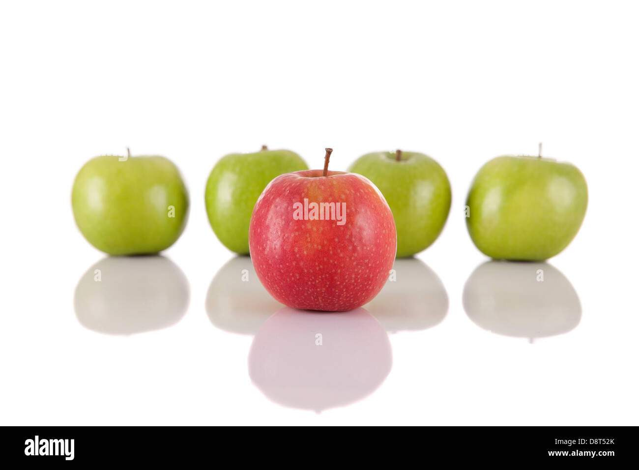 Red apple among green apples isolated on a white background Stock Photo ...