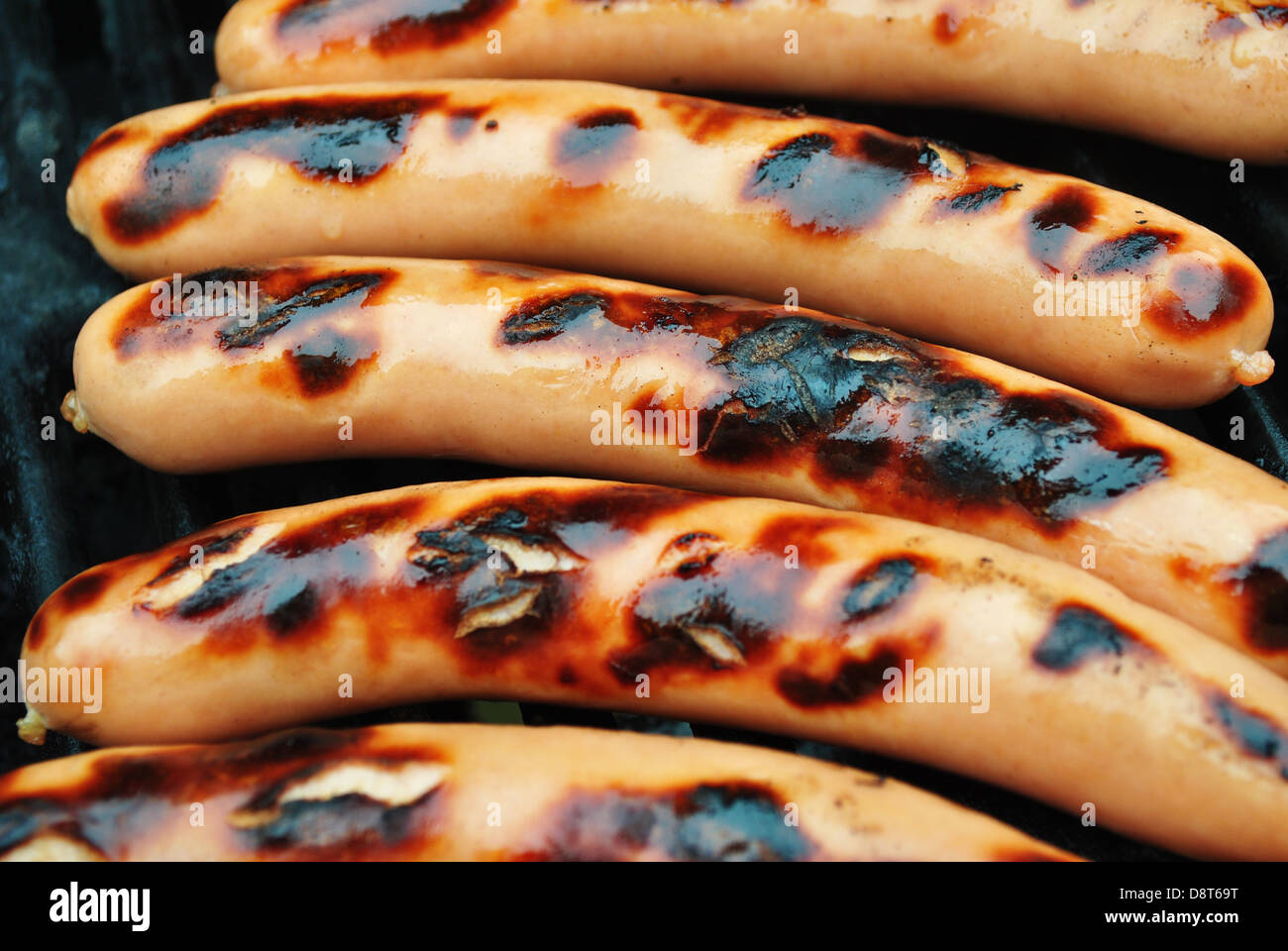 Grilling Fresh Hot Dogs Close-Up Stock Photo - Alamy