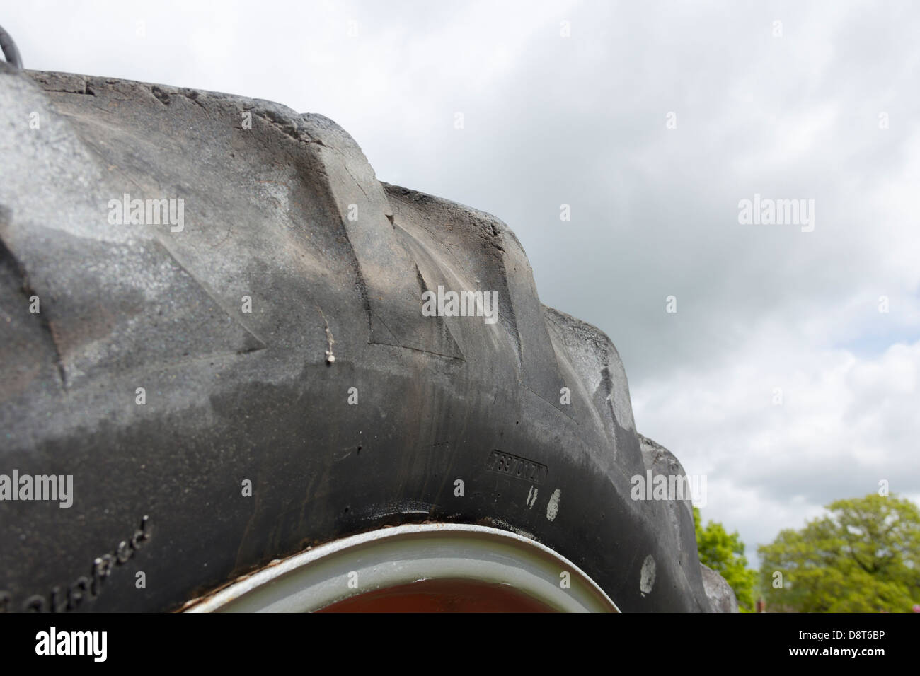 Close up low angle view of a section of a tractor tyre Stock Photo - Alamy