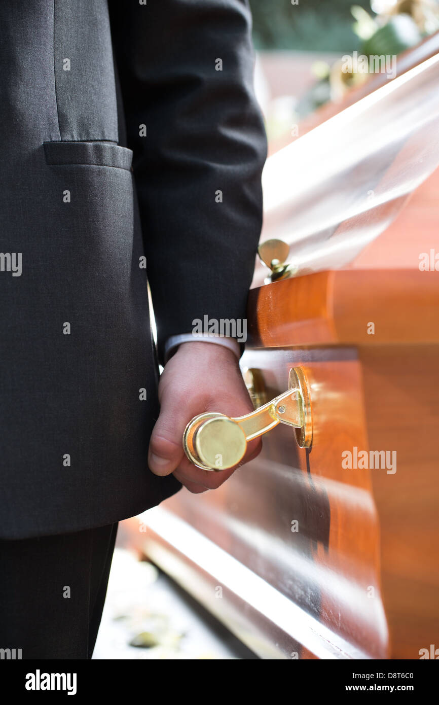 Carrying casket hi-res stock photography and images - Alamy